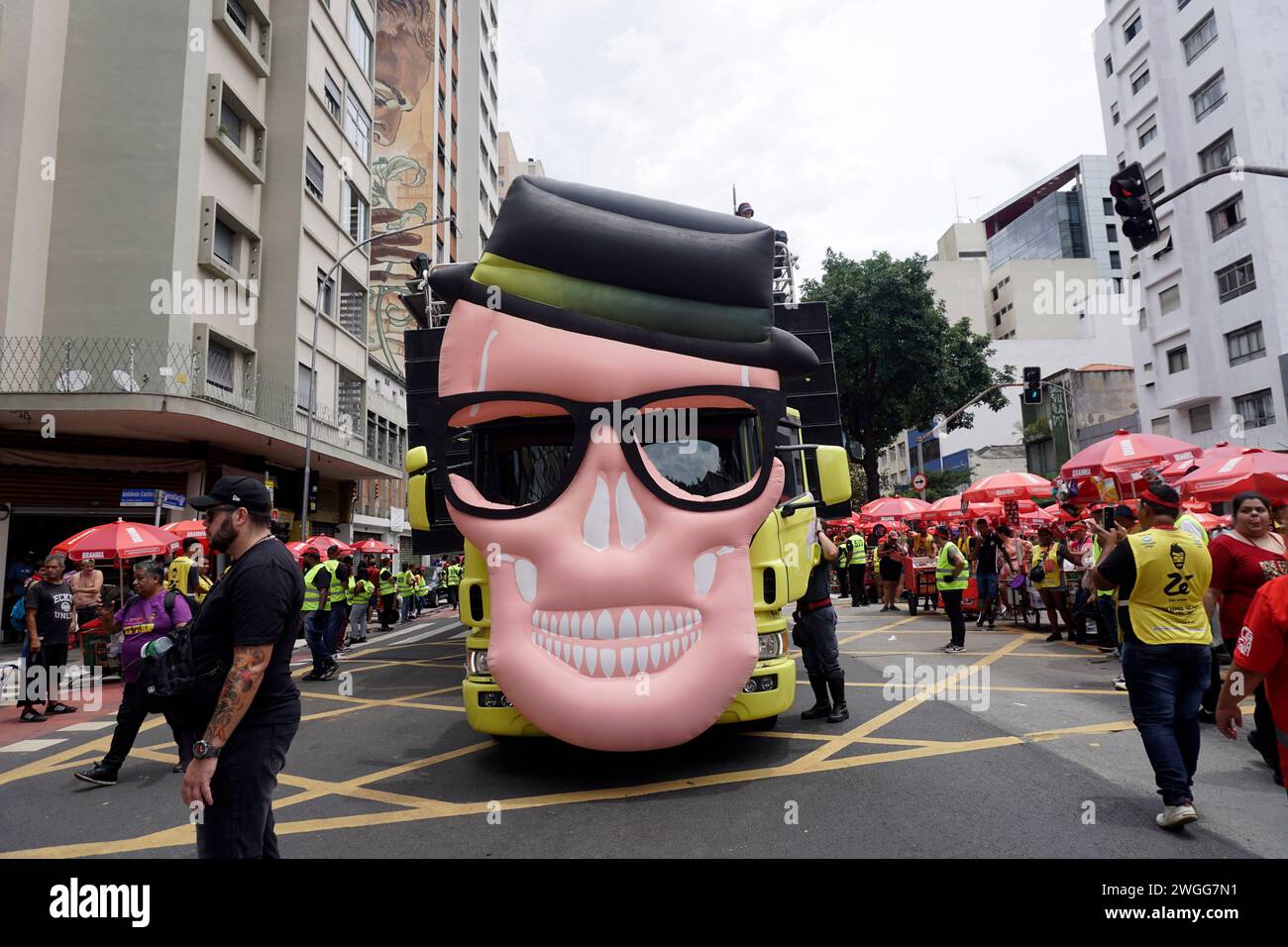 Revelers are participating in the ''Baixo Augusta'' block party during ...