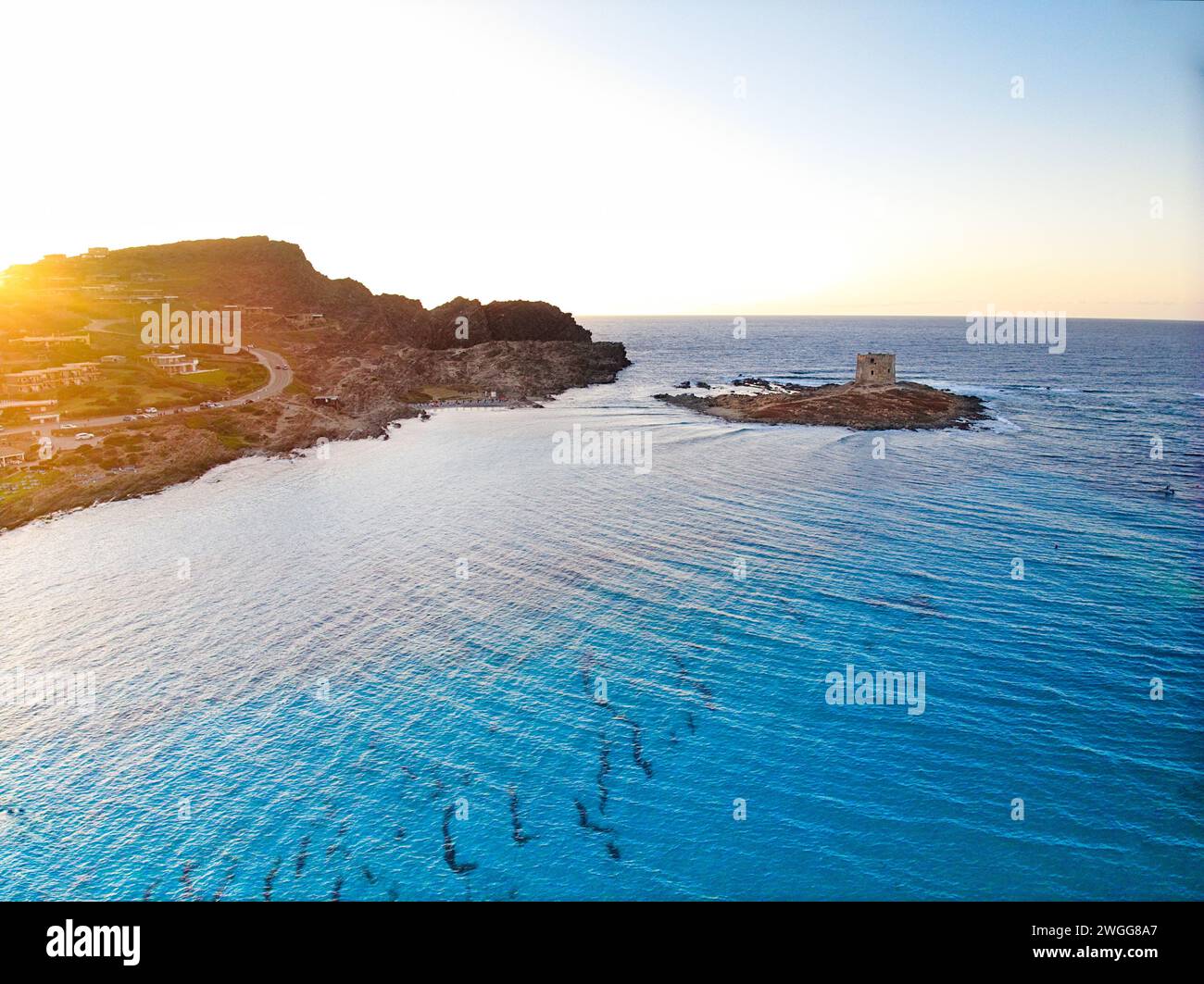 Aerial shot of Caletta della Torre islet by La Pelosa Beach, Sassari ...