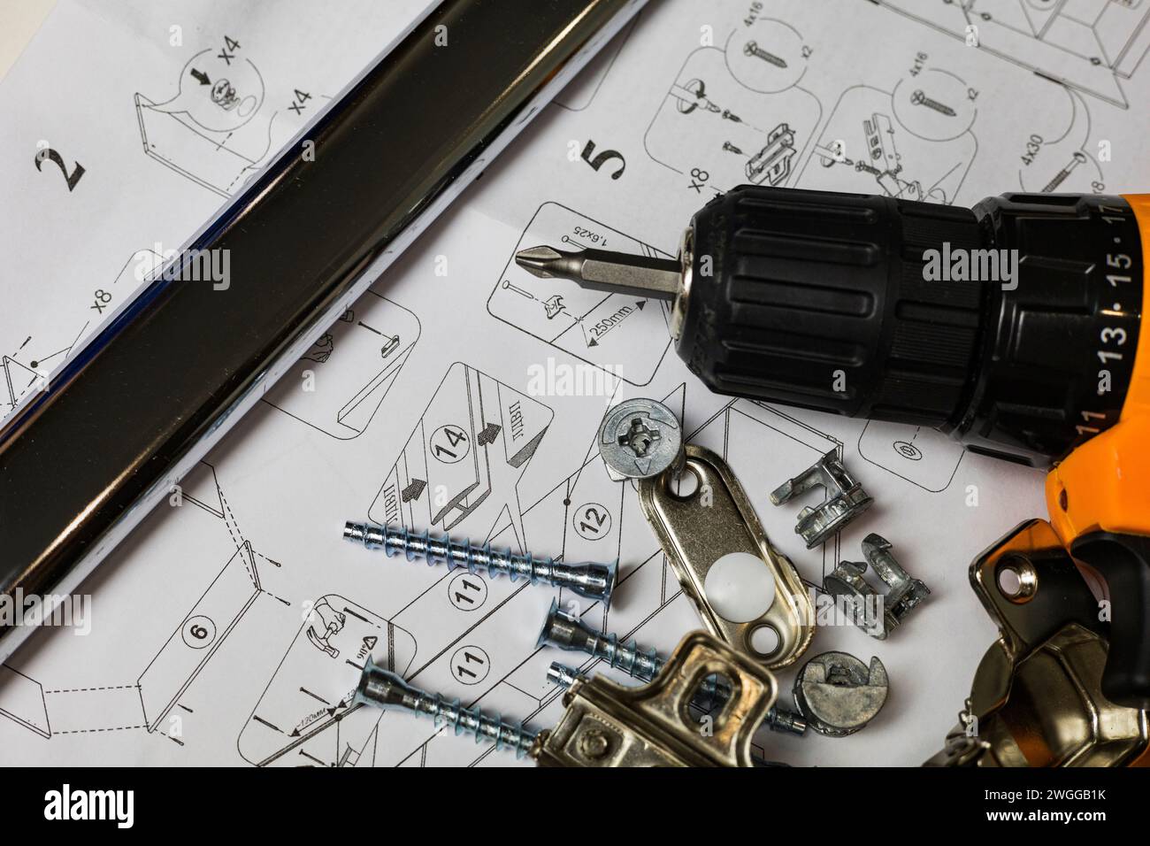 Furniture fittings. Furniture assembly hardware options and tools on a ...