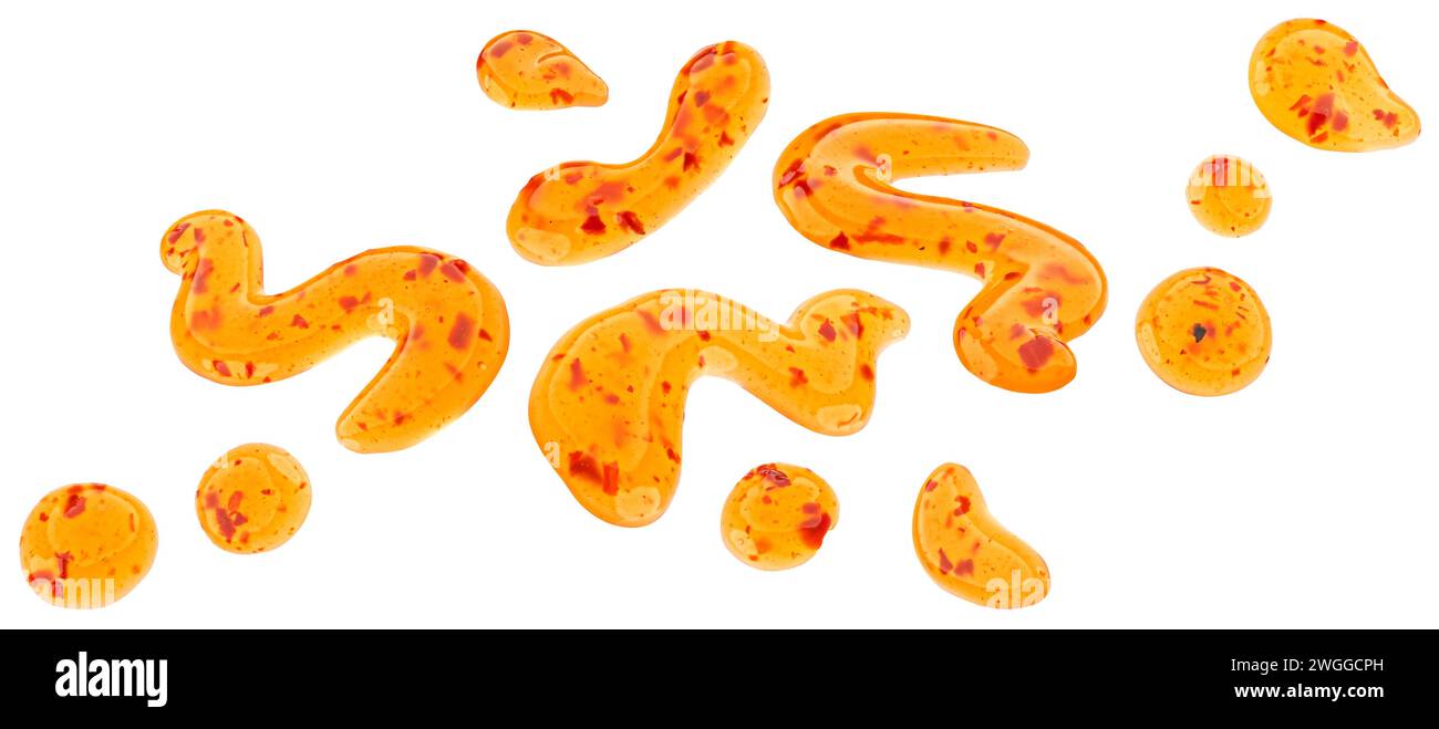 Red chili sauce drops isolated on white background Stock Photo - Alamy