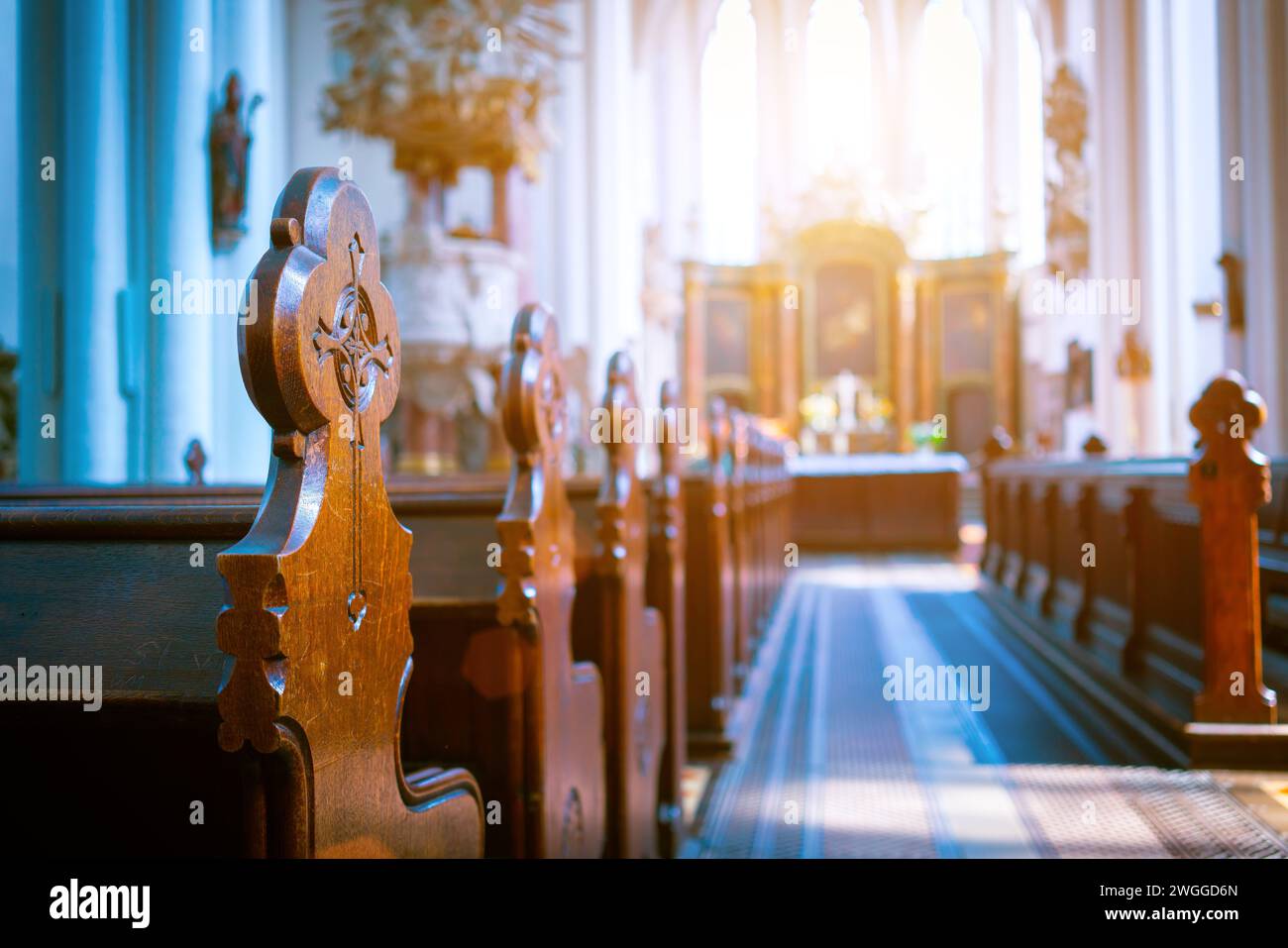 interior of a Catholic church with benches and icons Stock Photo - Alamy