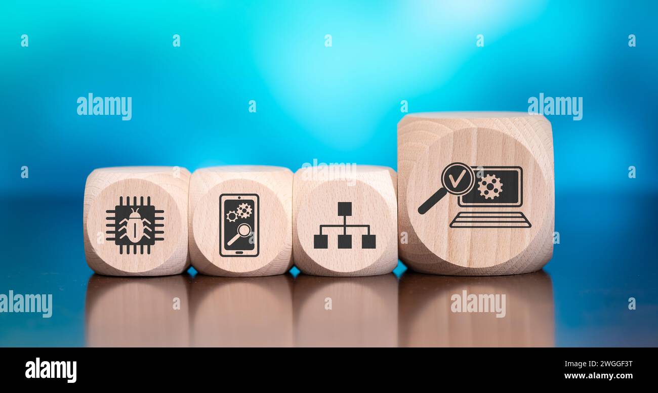 Wooden blocks with symbol of software testing concept on blue ...