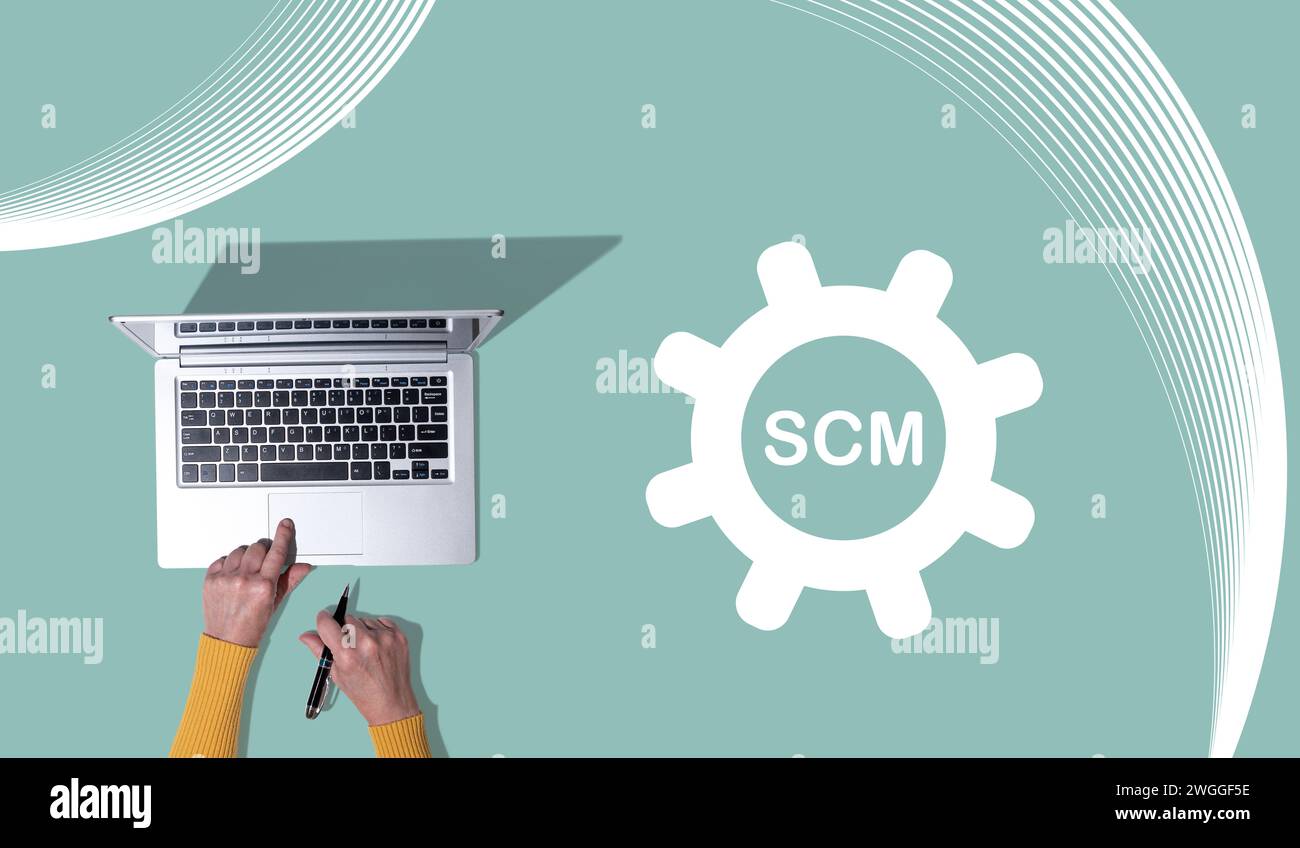 Top view of hands using laptop with symbol of scm concept Stock Photo ...
