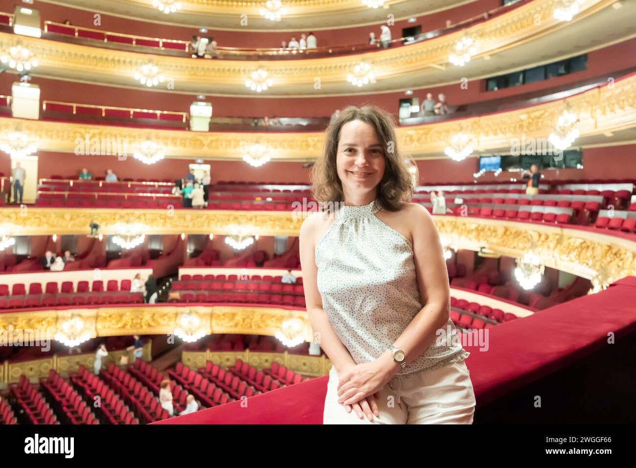 Watching theater balcony woman hi-res stock photography and images - Alamy