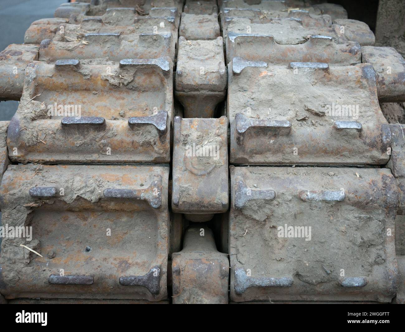 Close-up front view of a tank track with stuck pieces of soil Stock ...