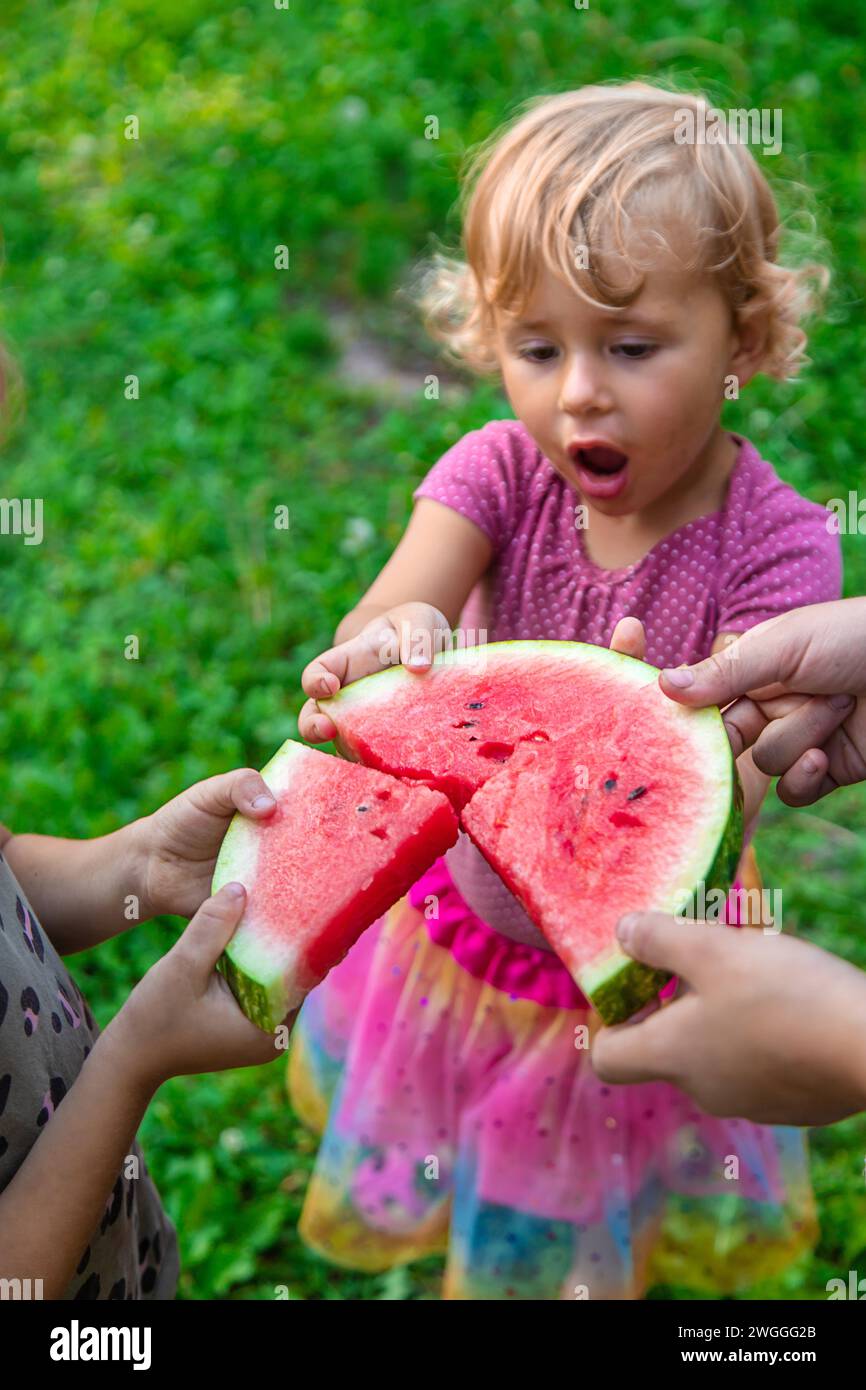 Baby eating watermelon picnic hi-res stock photography and images - Alamy