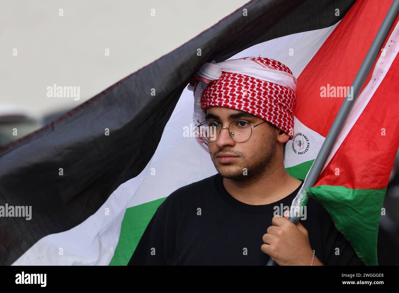 A man with a Palestinian flag during the demonstration in Naples in ...