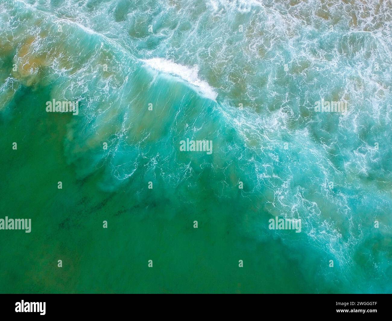 An aerial view of the green ocean waves Stock Photo - Alamy