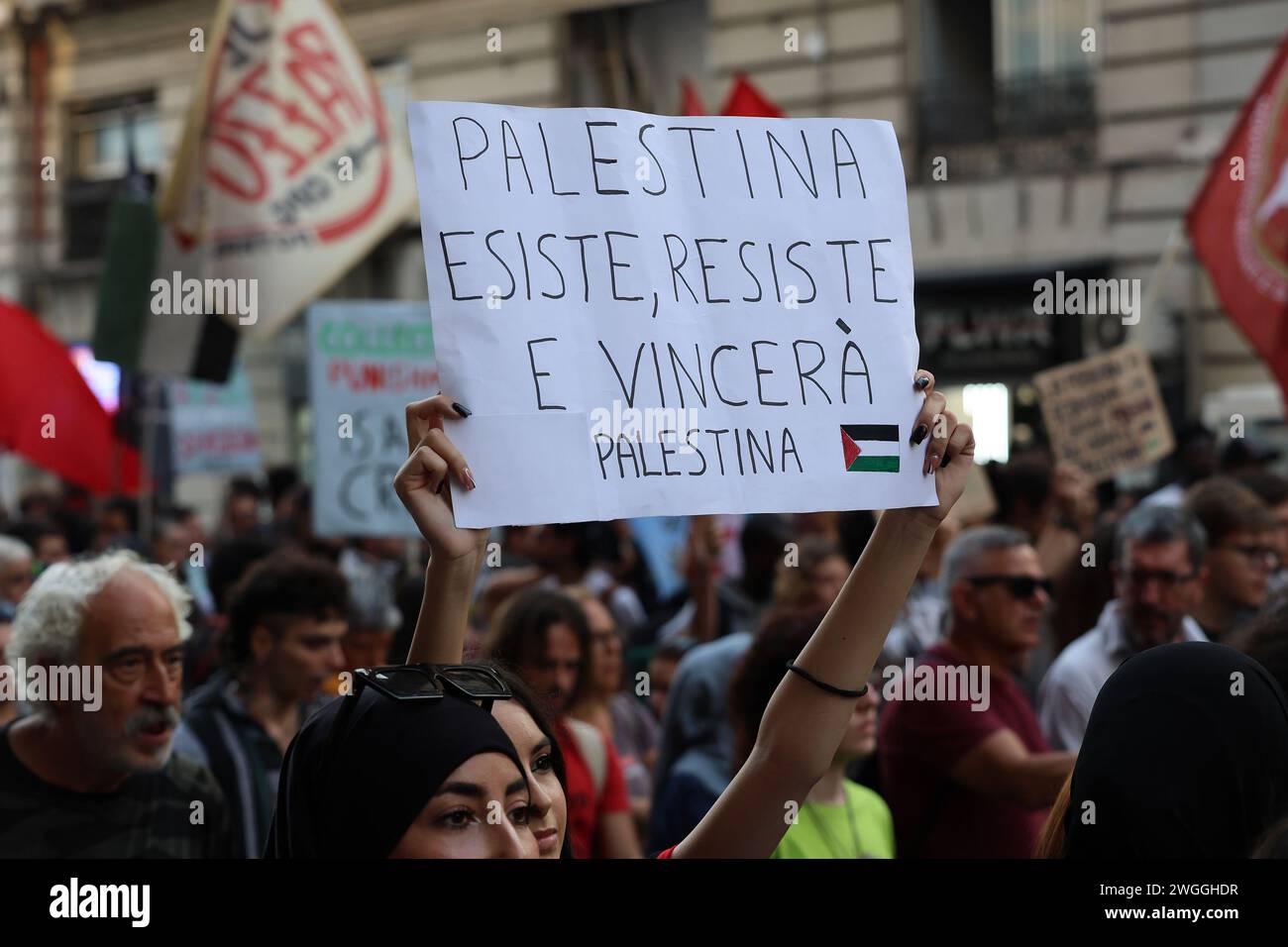 People with flags and placards, during the demonstration in Naples in ...