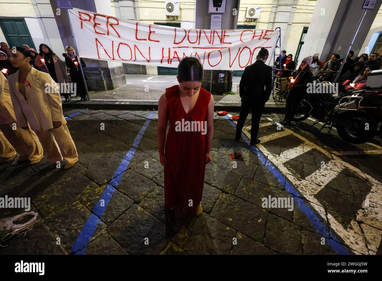A group of dancers performs during a torchlight procession for the ...