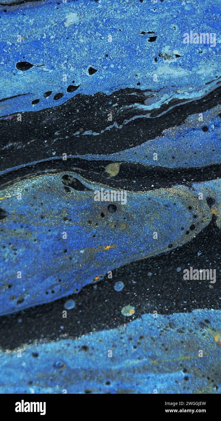 Shimmering paint background blue black gold mix Stock Photo - Alamy