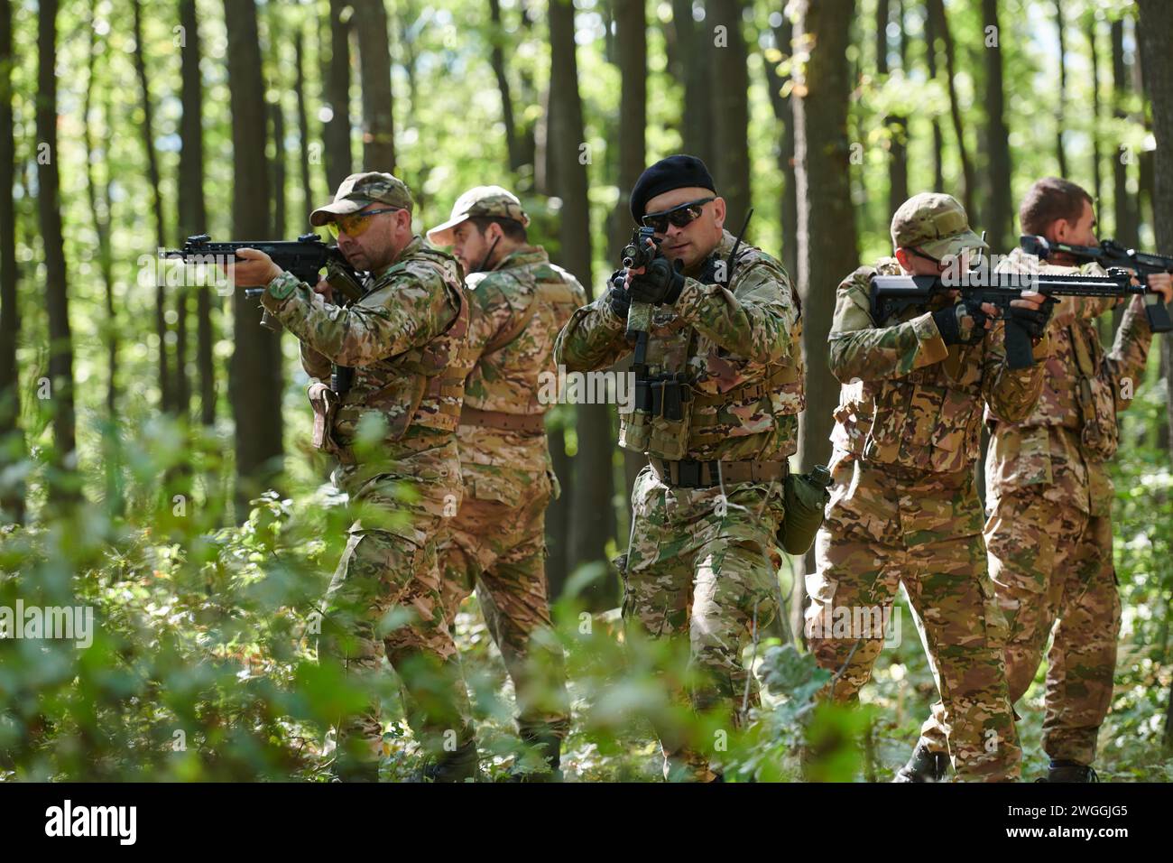 A specialized military antiterrorist unit conducts a covert operation ...