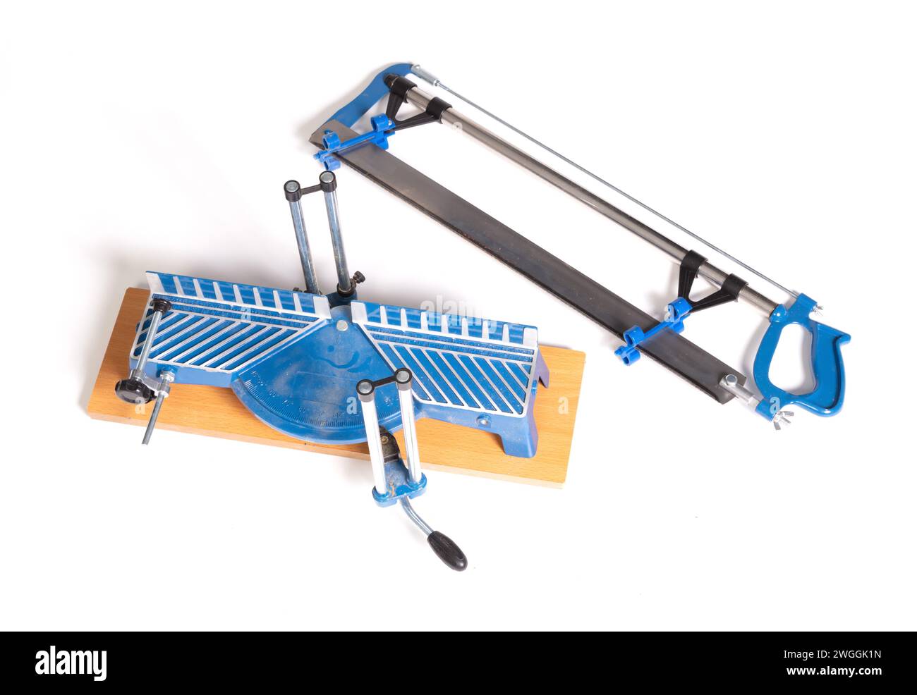 Vintage manual miter saw isolated on a white background Stock Photo - Alamy