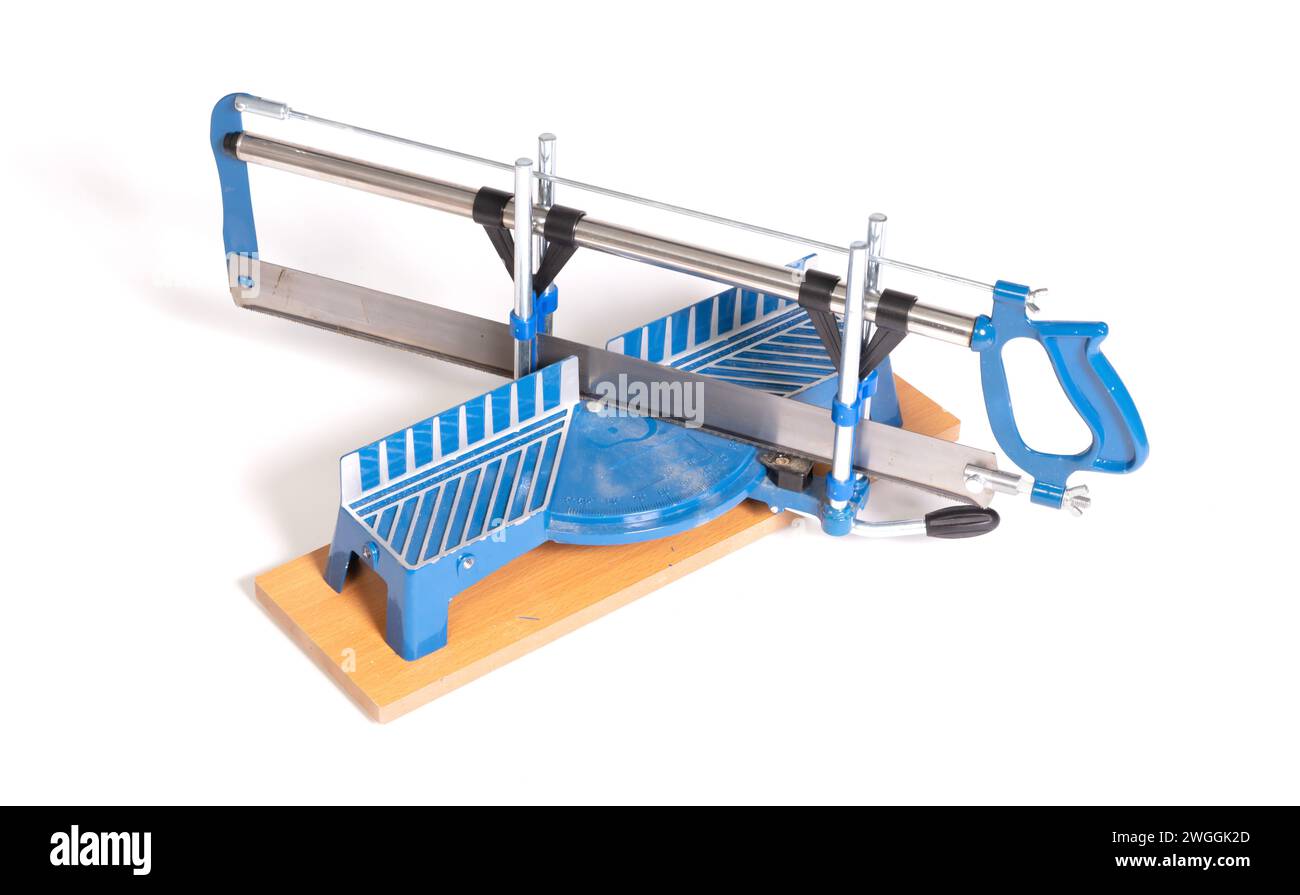 Vintage manual miter saw isolated on a white background Stock Photo - Alamy
