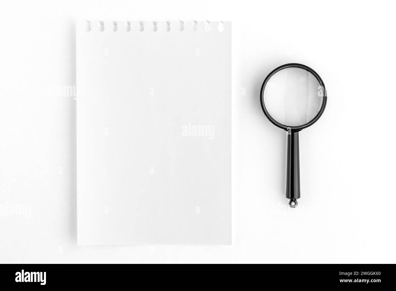 Notepad Page with Magnifying Glass. Check List Concept Stock Photo - Alamy