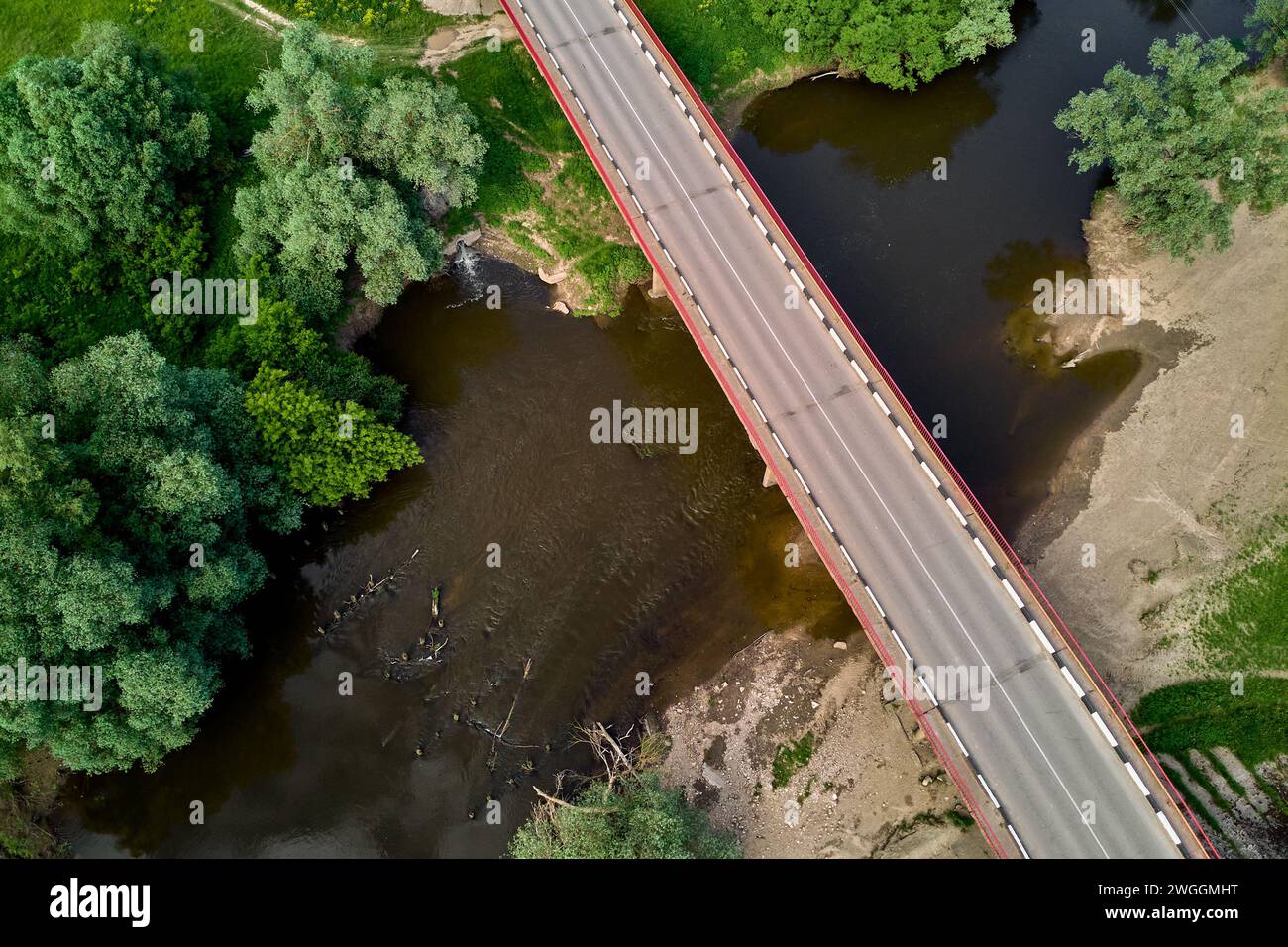 Aerial view of a road bridge over a small river Stock Photo - Alamy