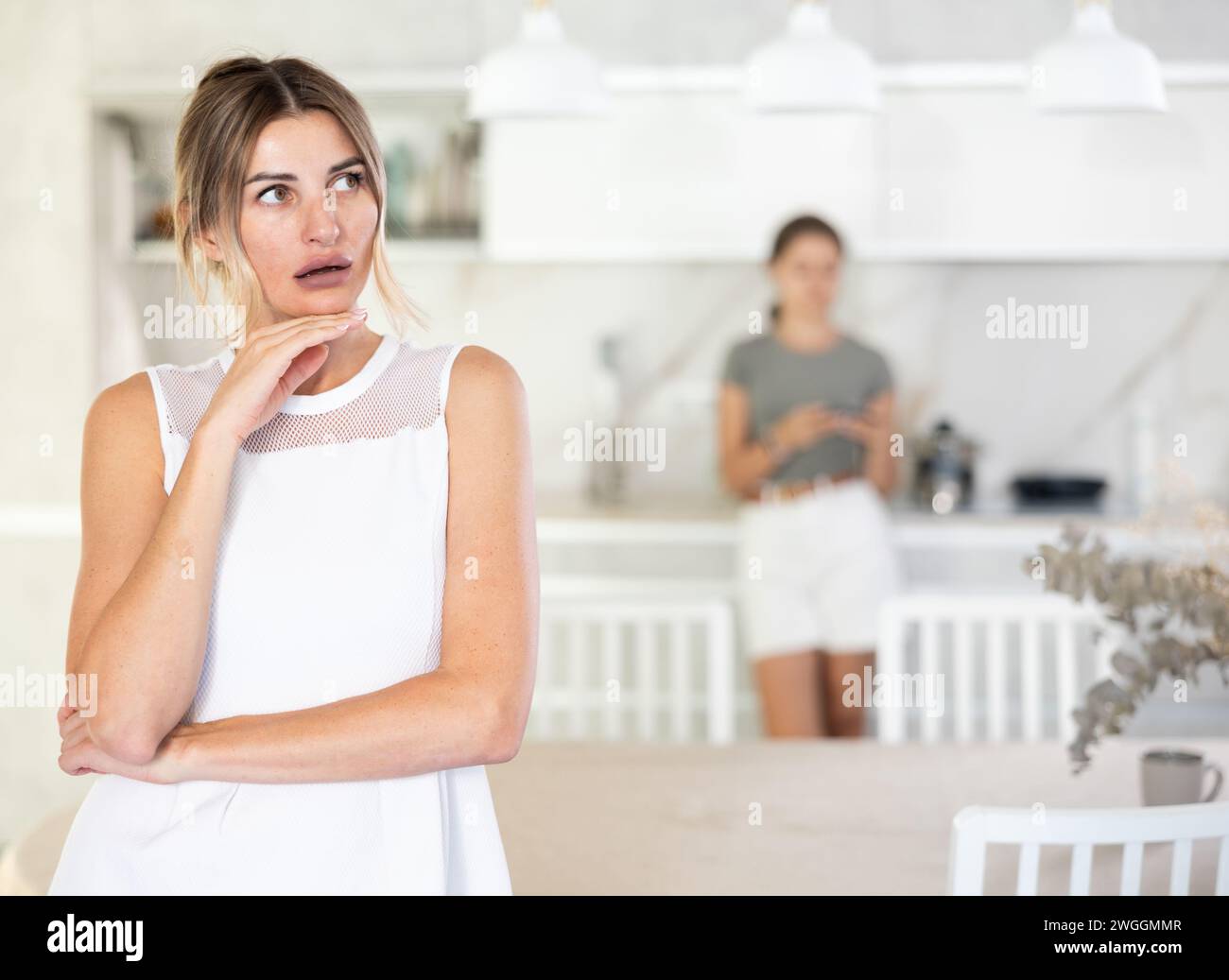 Domestic quarrel - two sisters have quarreled, and they are talking to ...