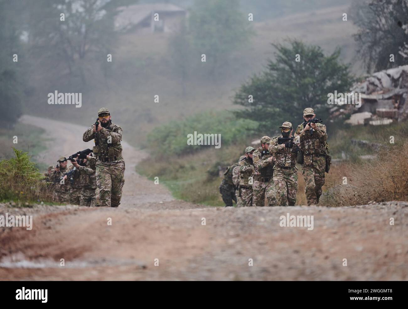 A disciplined and specialized military unit, donned in camouflage ...