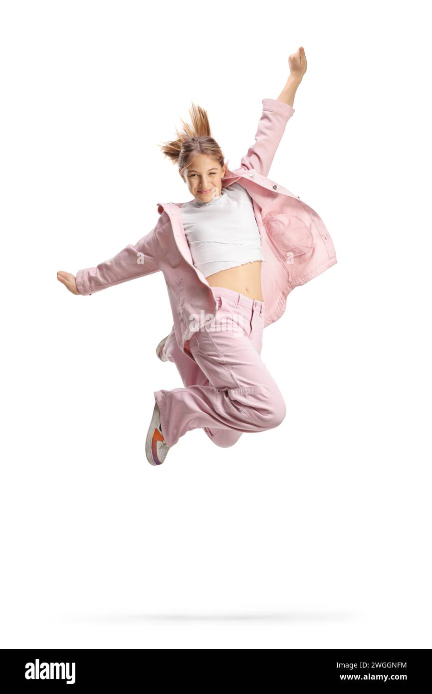 Happy female teenager jumping isolated on white background Stock Photo ...