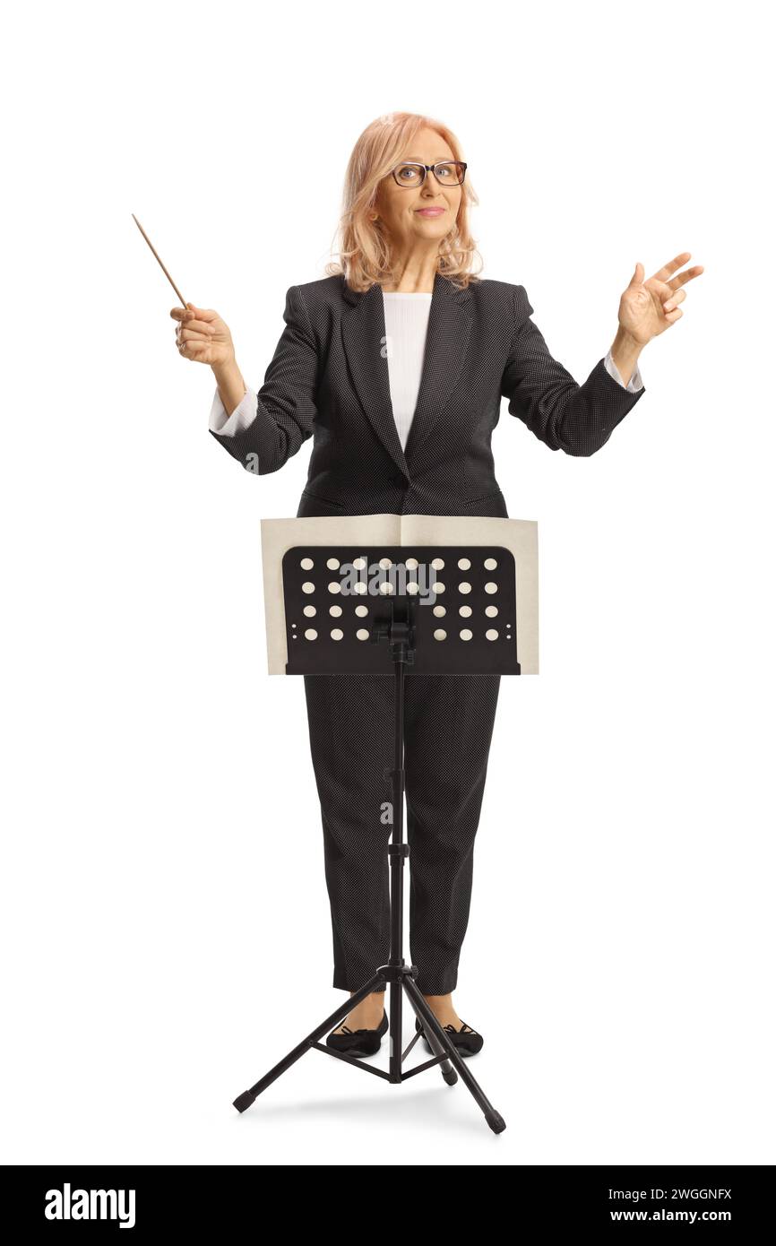 Female conductor behind a music note stand isolated on white background ...