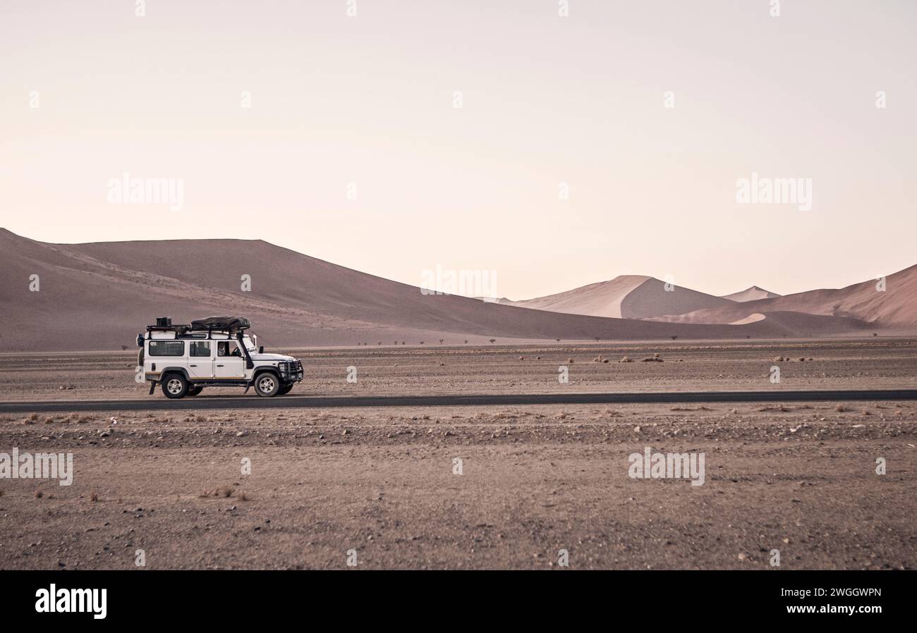Off-road car standing in Namib Desert, Sossusvlei, Namibia Stock Photo ...