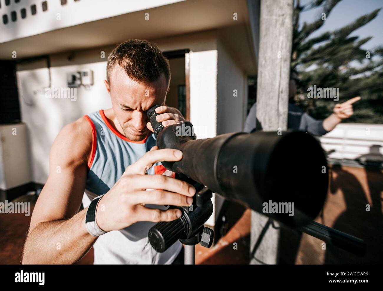 Man looking through telescope hi-res stock photography and images - Alamy