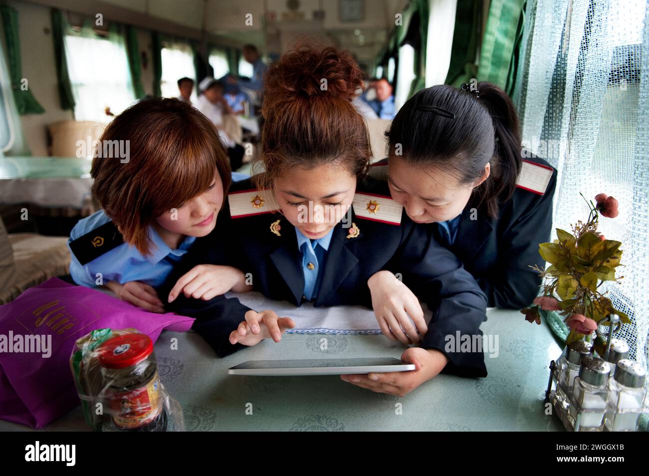 Chinese Railway officers with iPad Stock Photo - Alamy