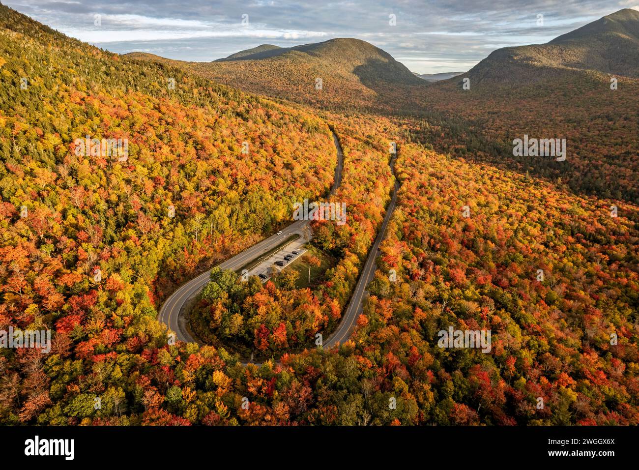 Tight mountain switchback in fall foliage, Kancamagus Highway Stock ...