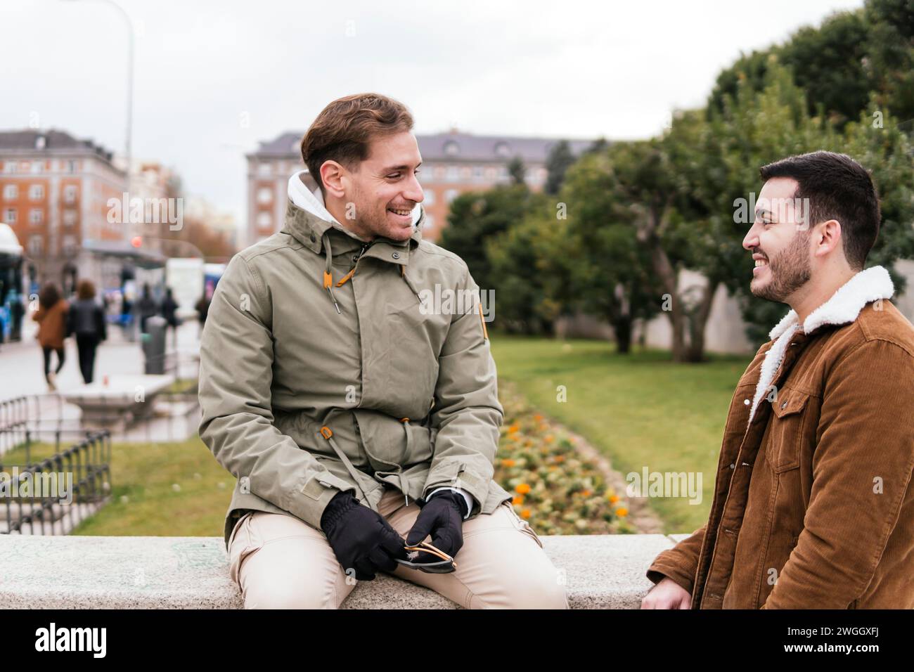 Two friends in conversation outside hi-res stock photography and images ...