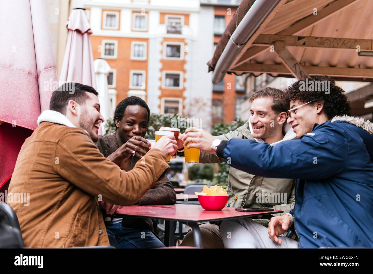 Young multiracial people drinking hi-res stock photography and images ...