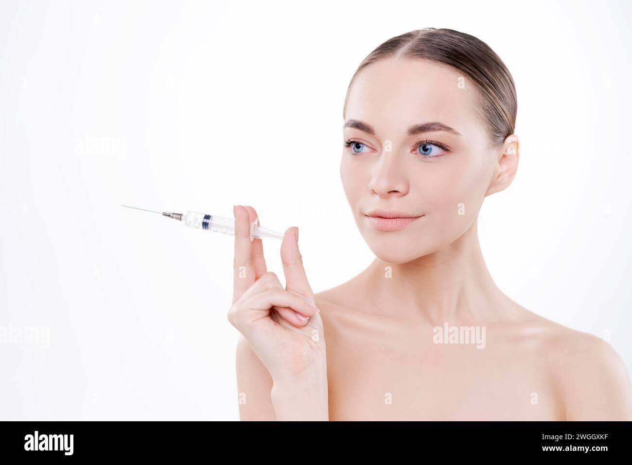 Skincare, woman and face injection for plastic surgery in studio isolated on white background ...