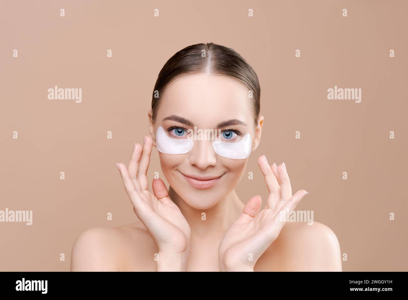 Eye patch. Beauty woman face with under eye collagen pads. Studio shot ...