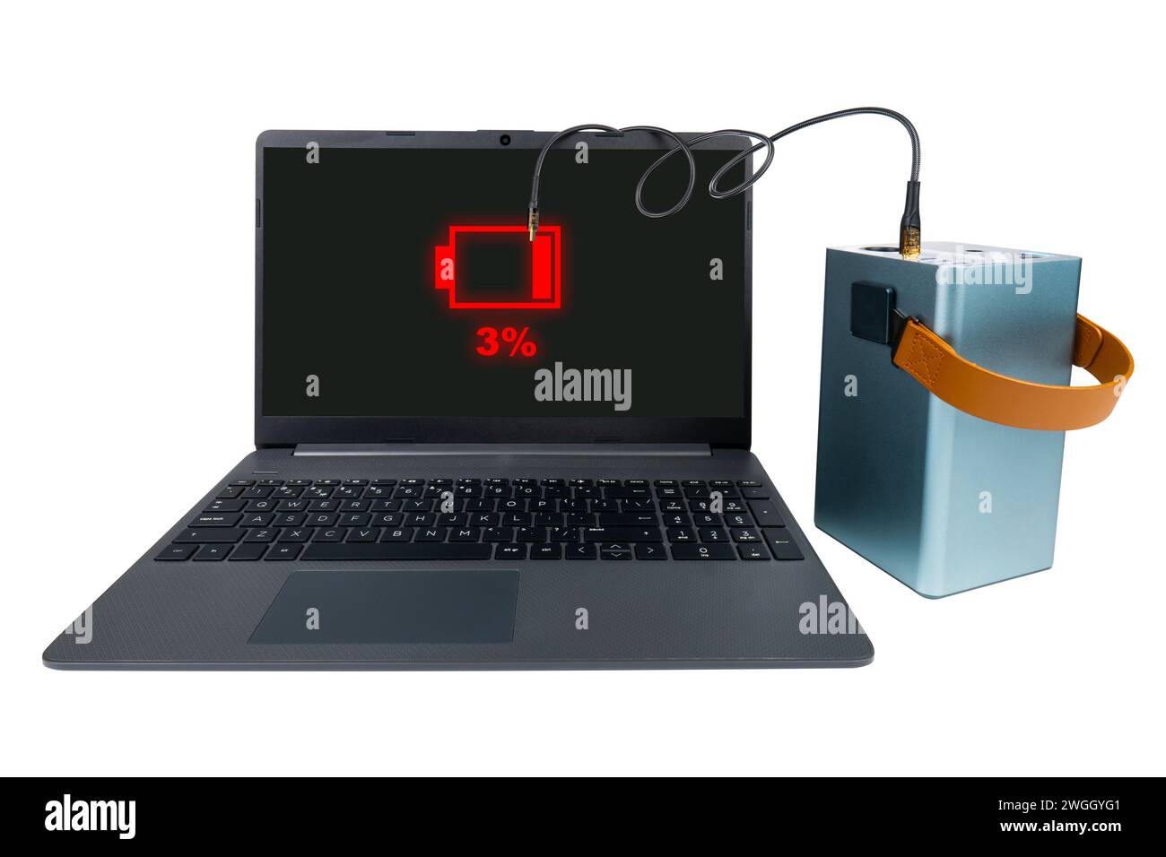 Laptop next to a power bank with a USB cable on a white background. On ...