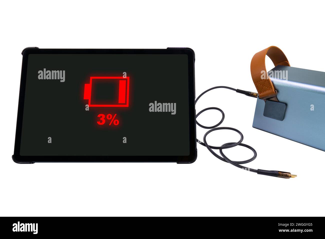 Tablet PC next to a power bank with a USB cable on a white background ...
