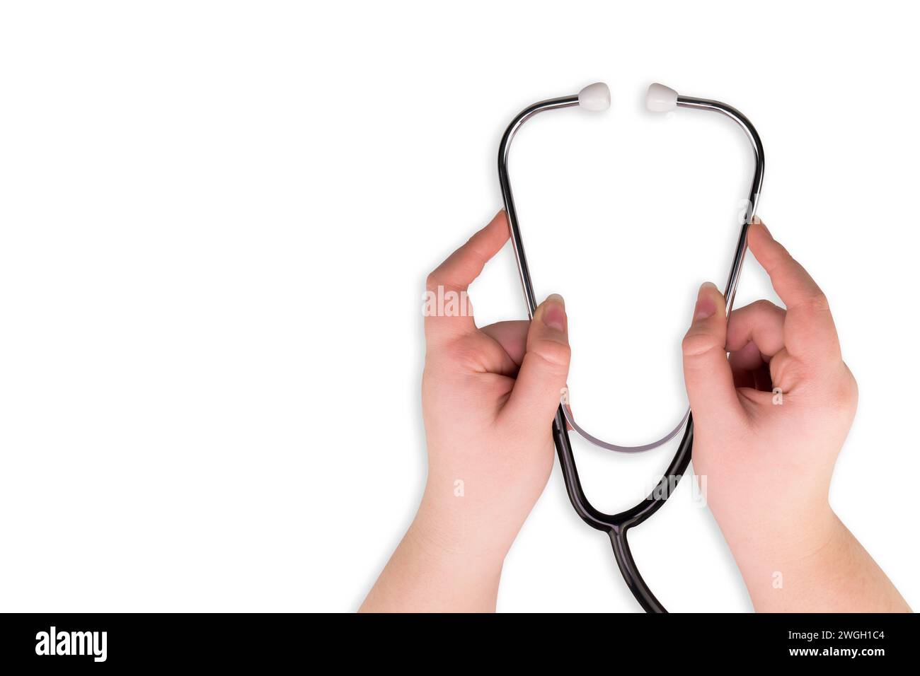 Medical stethoscope in hands, close-up, isolated on a white background ...