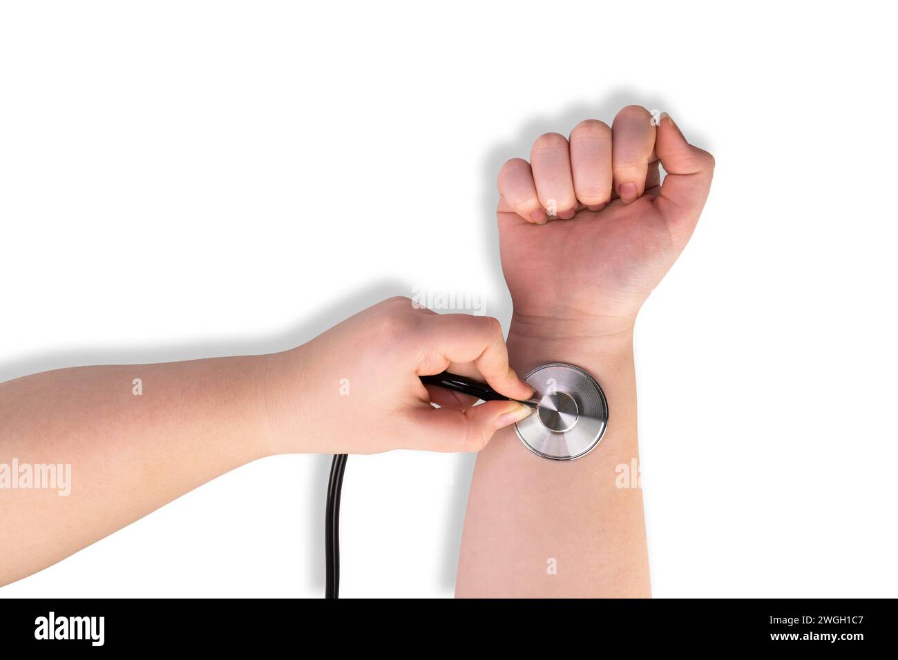 Head of a medical stethoscope on the wrist, close-up, isolated on a ...