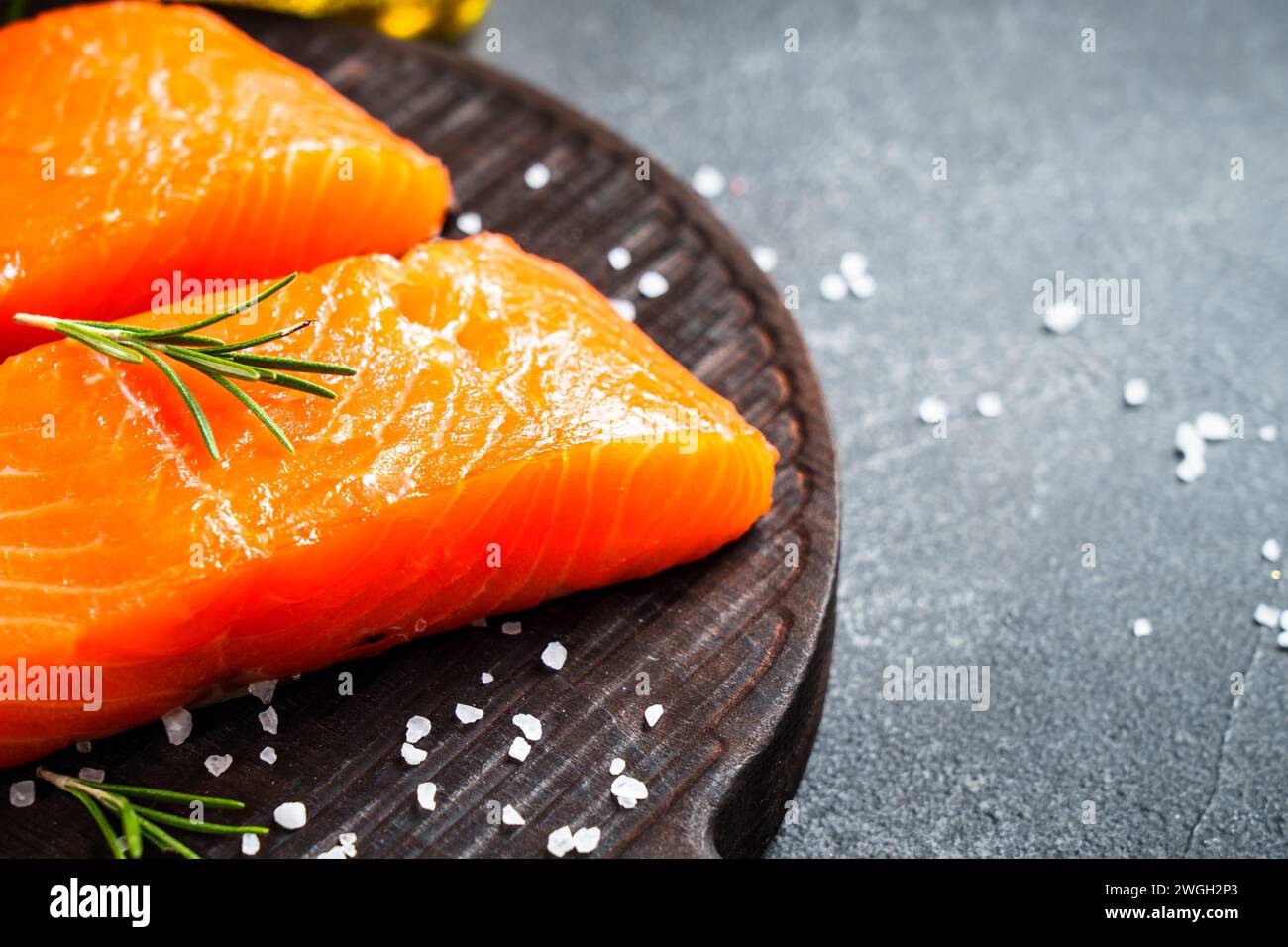 Salmon fillet with lemon and spices Stock Photo - Alamy