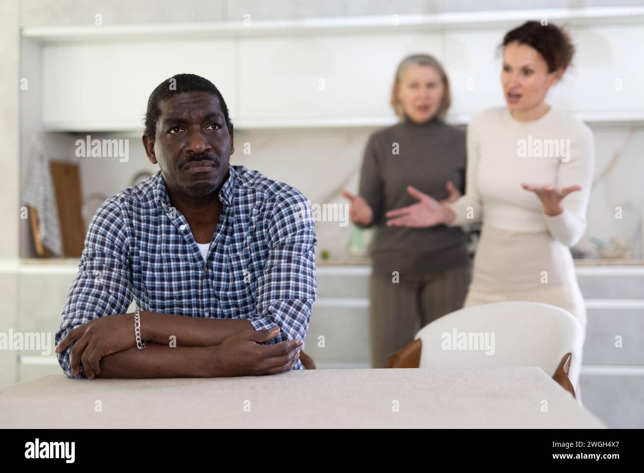Woman and resentment and kitchen hi-res stock photography and images ...