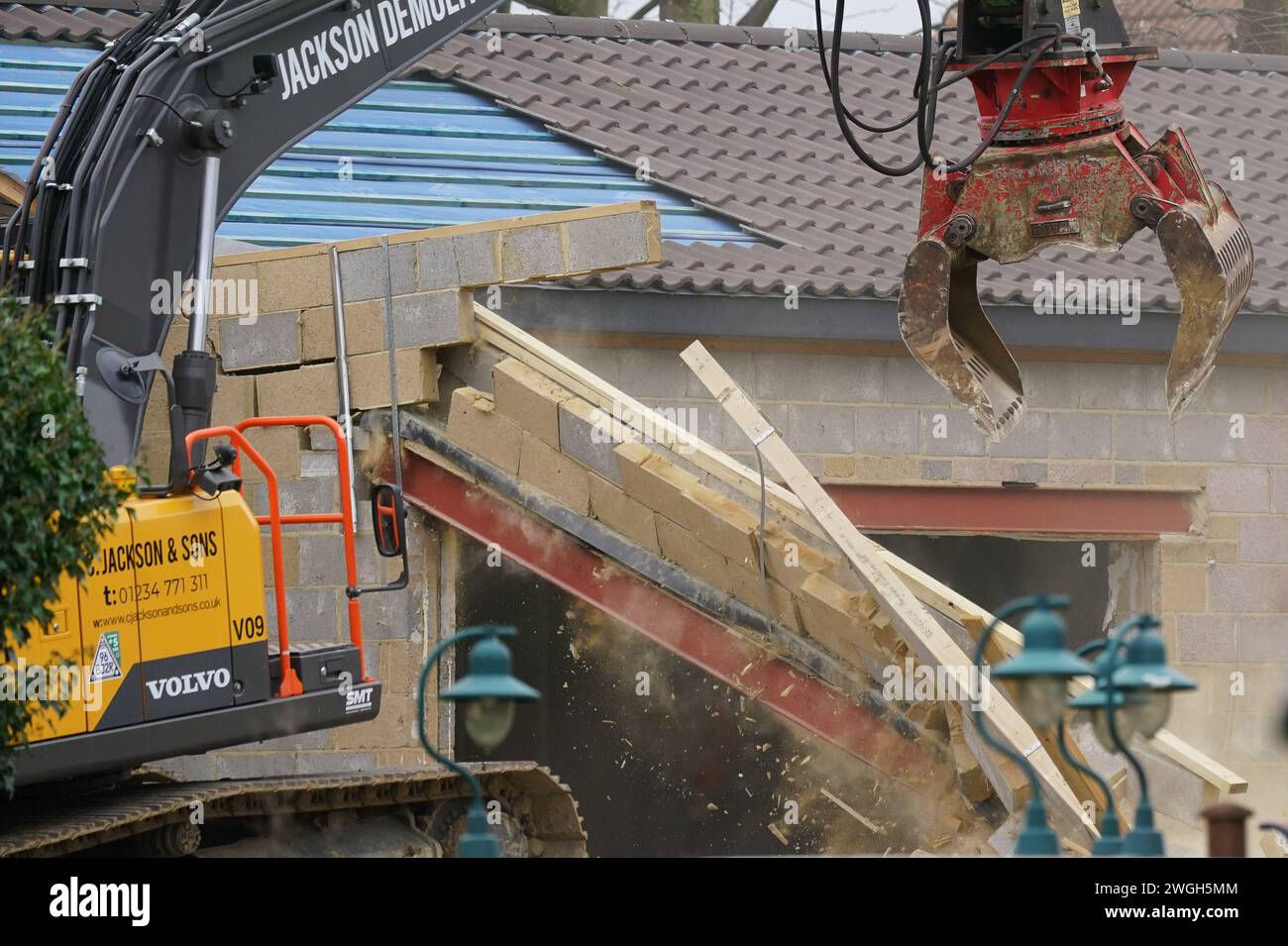 Work continues to demolish an unauthorised spa pool block at the home ...