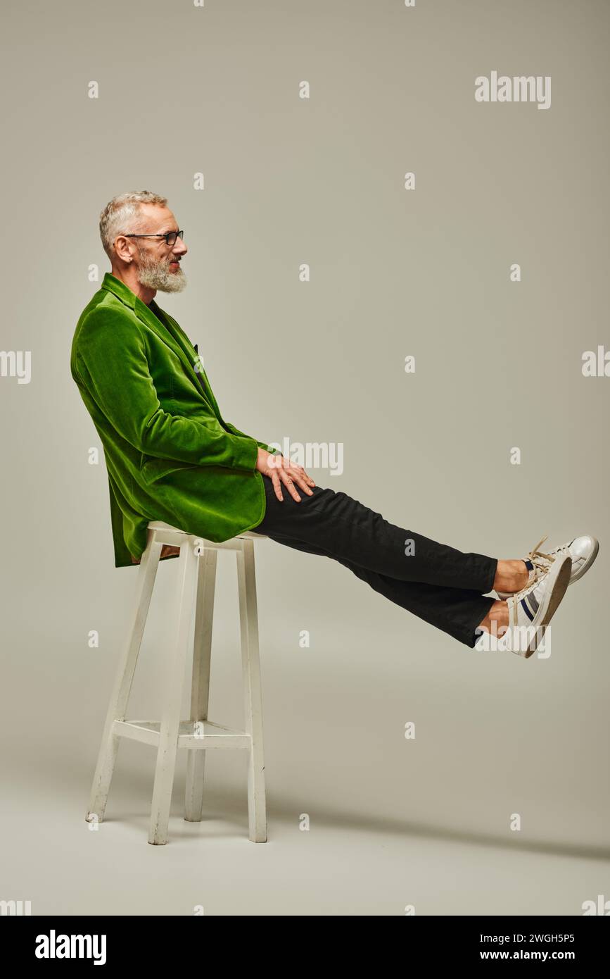 handsome funky mature male model in bright attire with accessories ...