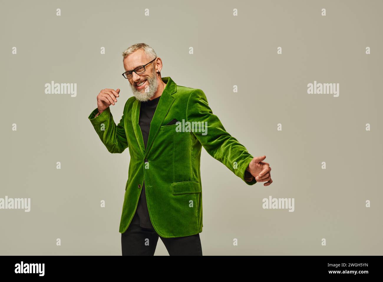 joyous handsome cool mature male model with gray beard and glasses ...