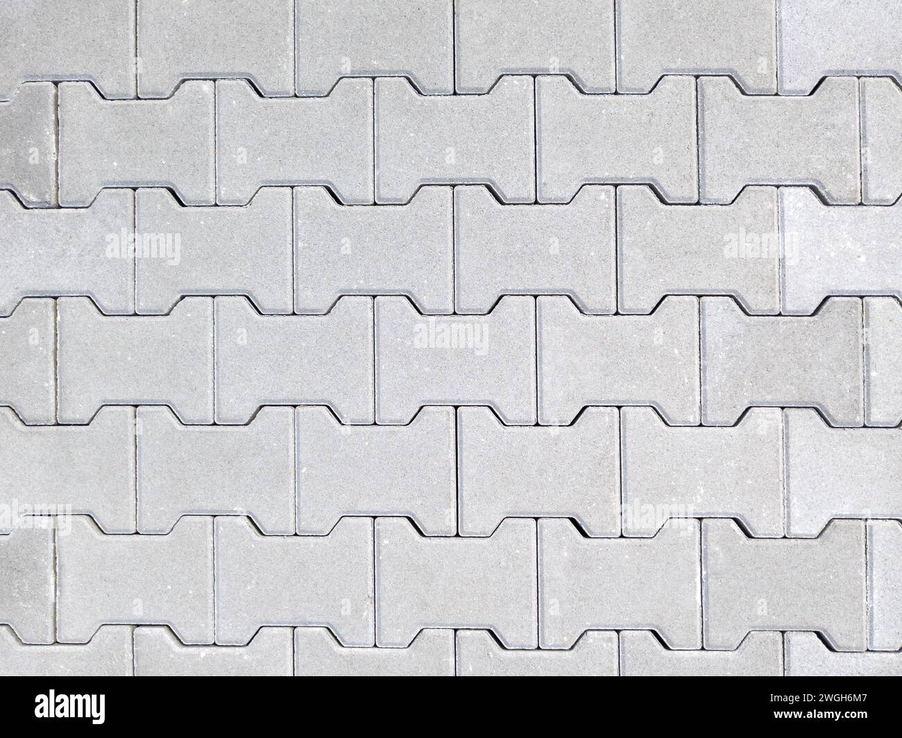 interlocking concrete block pavement background Stock Photo - Alamy