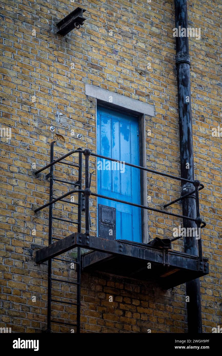 Back door and ladder, West End, London, England, UK Stock Photo - Alamy