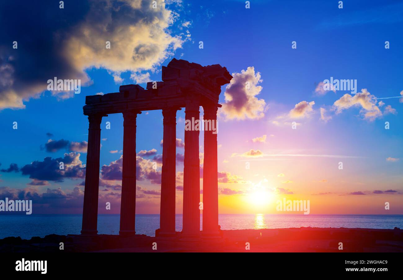 Ancient Ruins with Ocean Sunset and Architectural Columns Stock Photo ...