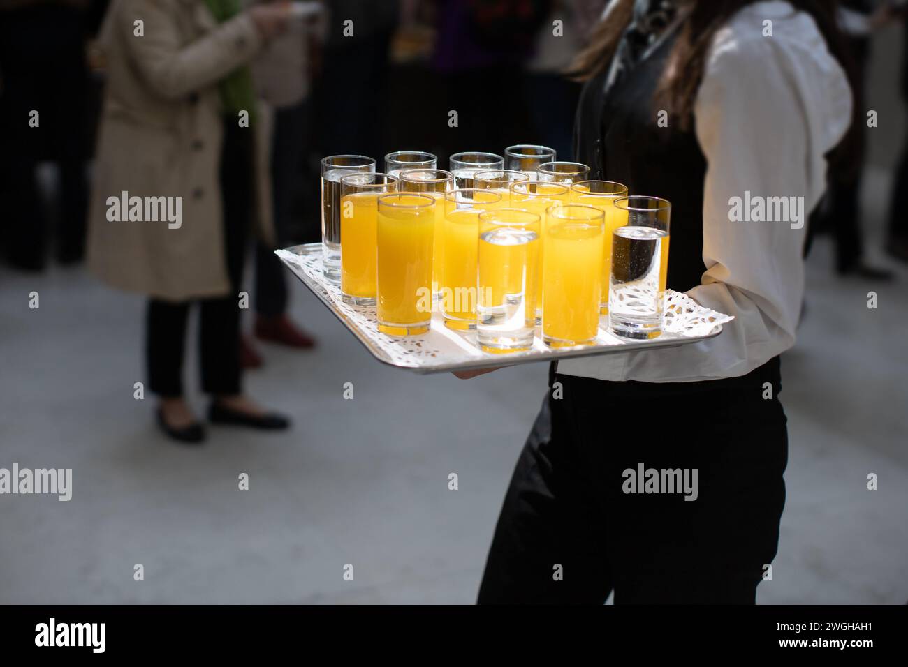 Offering drink drinks hi-res stock photography and images - Alamy