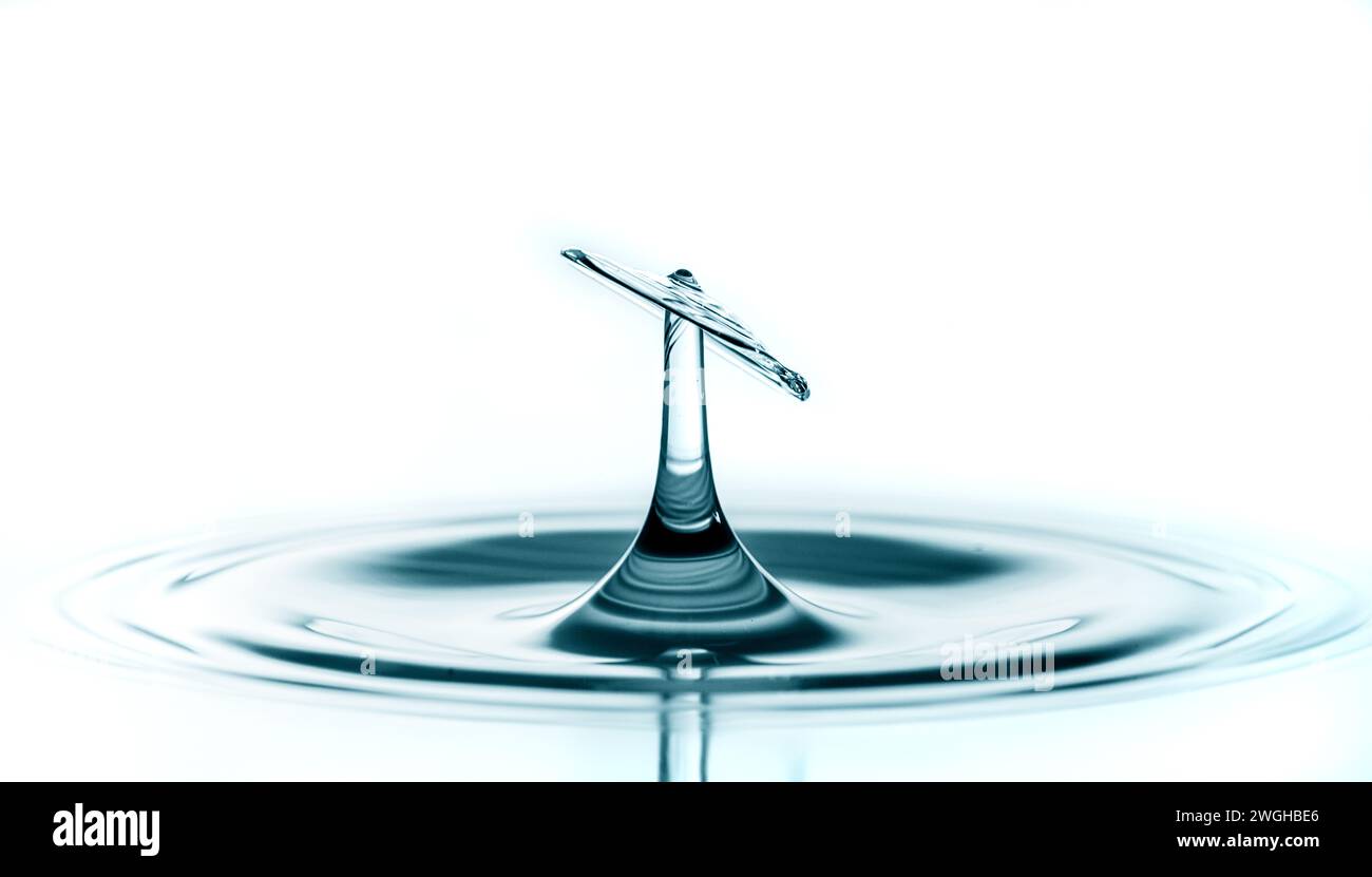Clean Water Droplet Falling in Motion on White Background Stock Photo ...