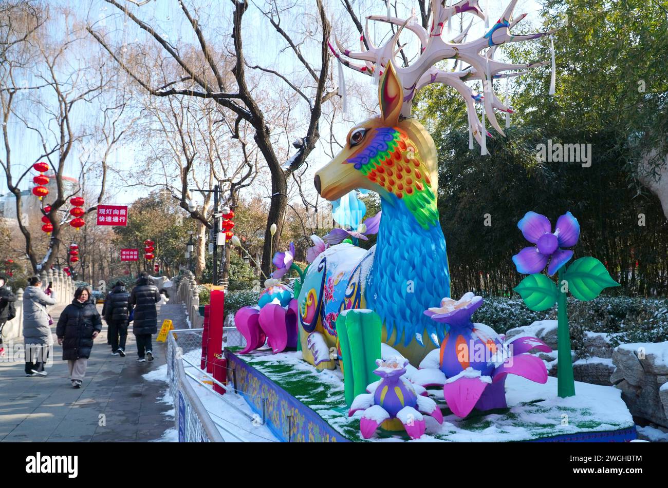 Jinan, China's Shandong Province. 5th Feb, 2024. Tourists walk past ...