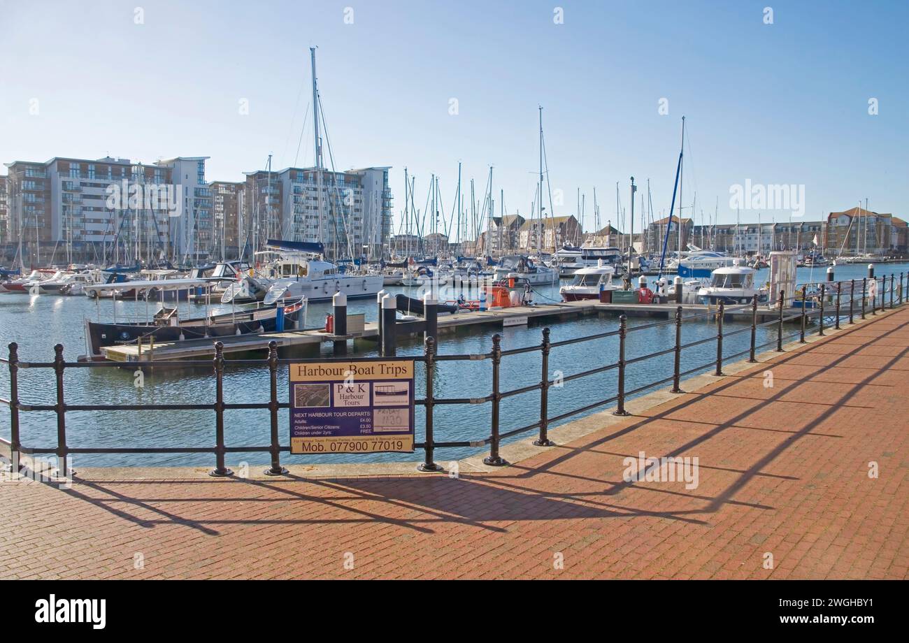 boats moored in eastbourne sovereign harbour on the east sussex coast ...