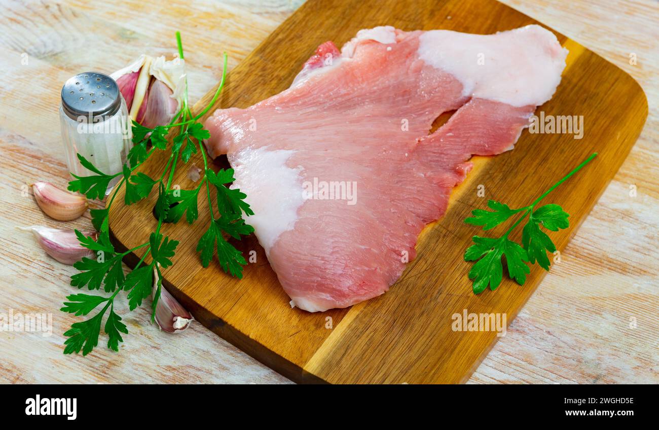 Fresh raw pork secreto fillet (Secreto de cerdo) and condiments ...