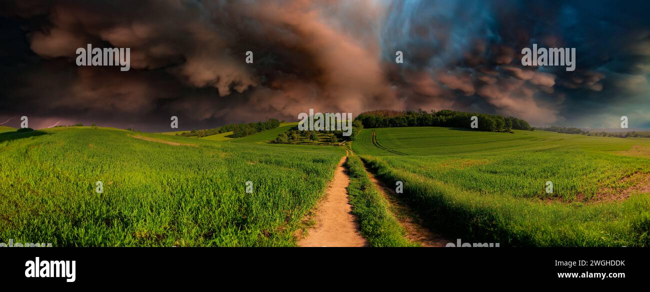 Rural Haven: Majestic Landscapes, Flourishing Crops, and Dramatic Skies Stock Photo - Alamy